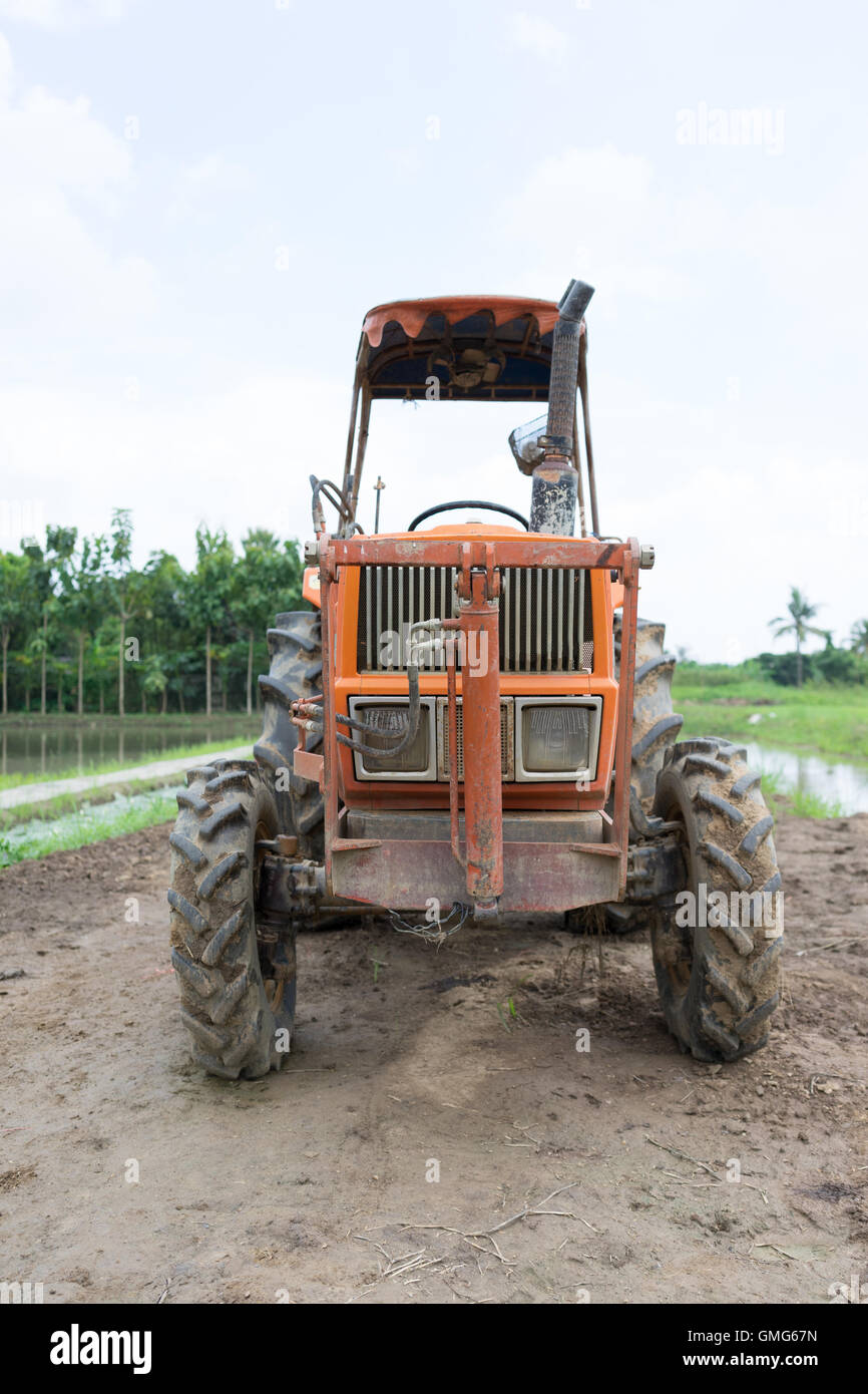 Tractor in rice field hi-res stock photography and images - Alamy