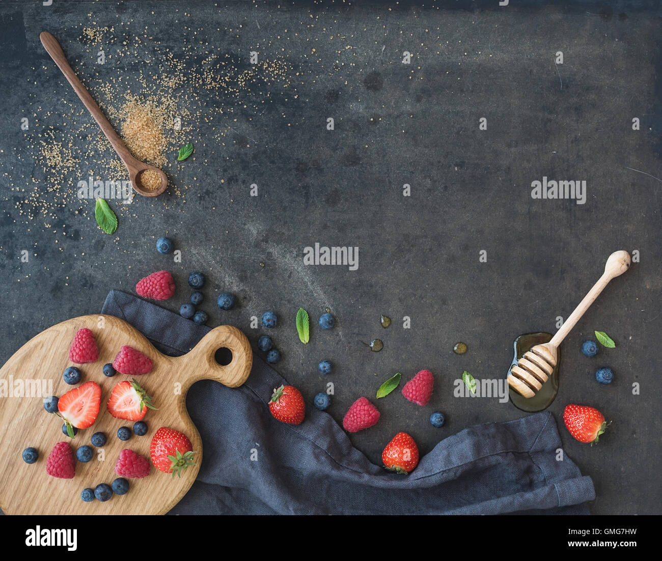 Berry frame with copy space on right. Strawberries, raspberries ...