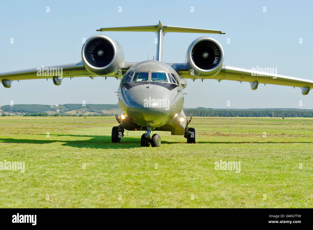 Light military-transport jet An-72 at the airfield in a bright sunny ...
