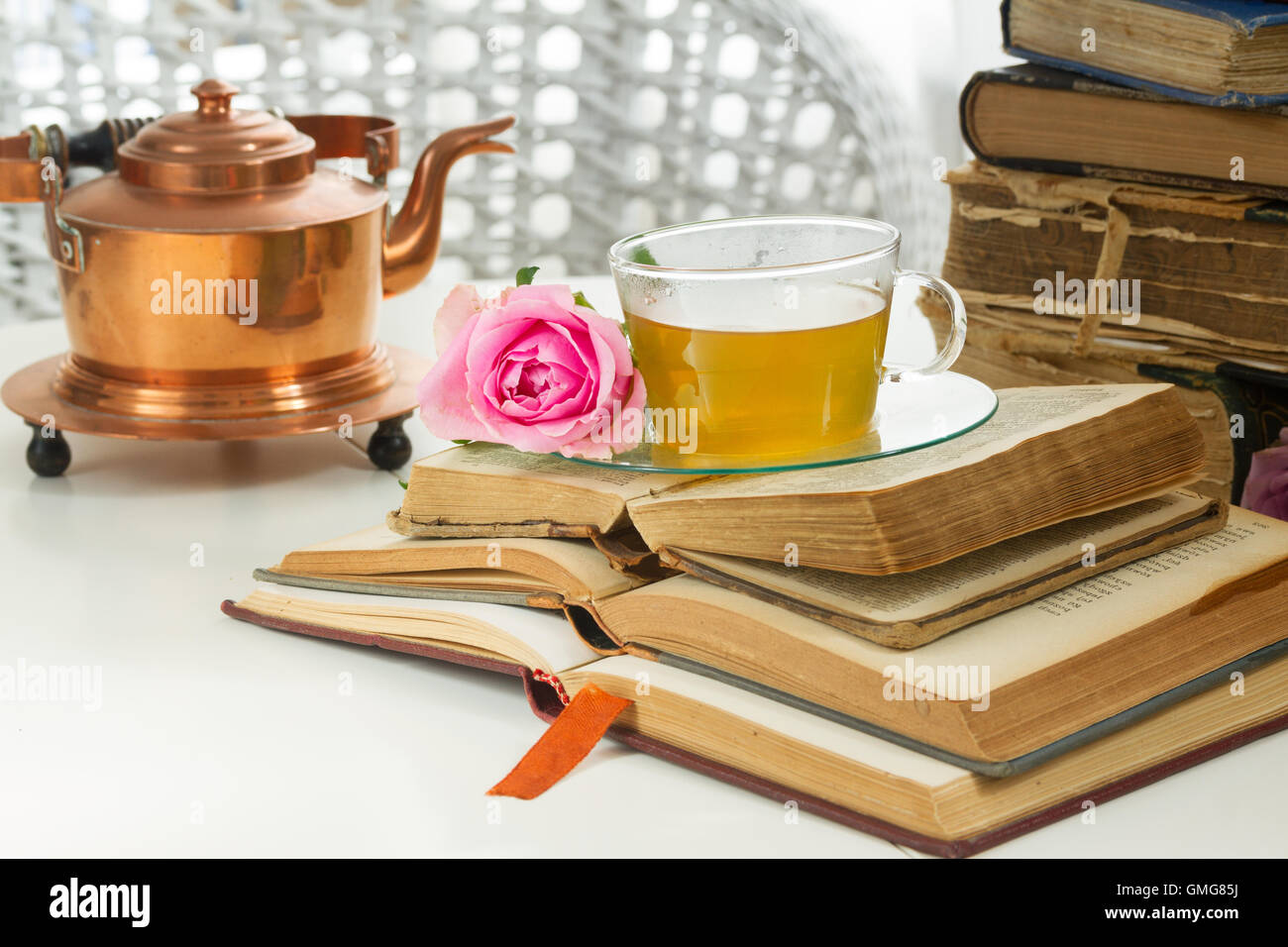 Pile book table teacup hi-res stock photography and images - Alamy