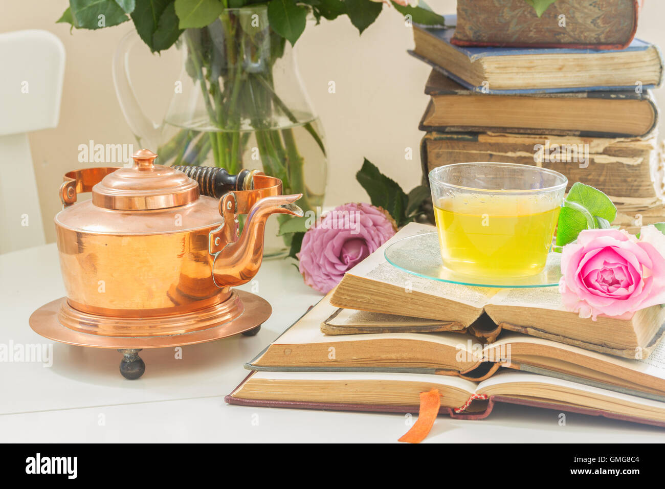 Cup of tea with books Stock Photo - Alamy