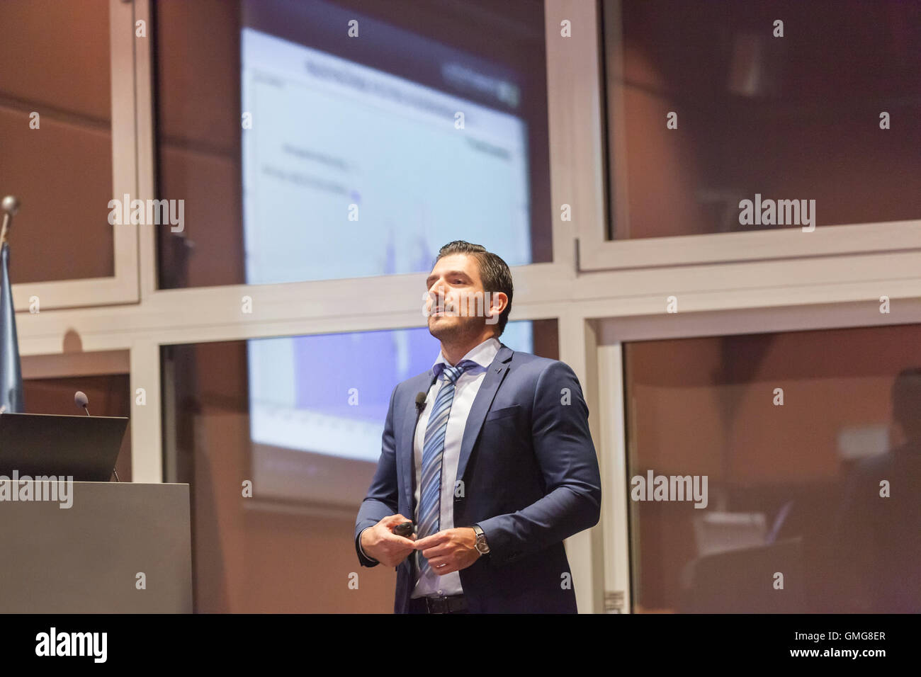 Speaker giving talk at Business Conference Stock Photo - Alamy