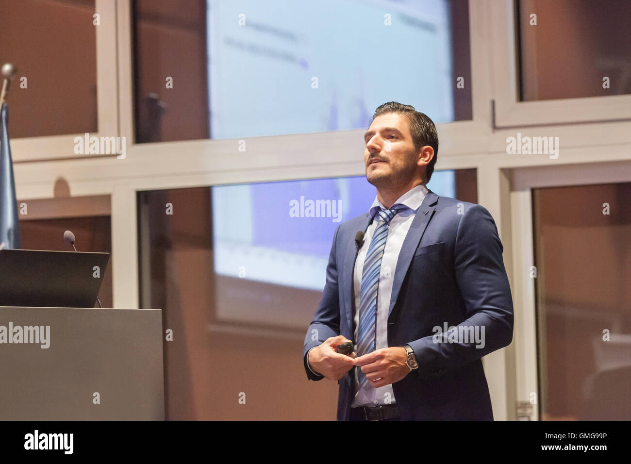 Speaker giving talk at Business Conference Stock Photo - Alamy