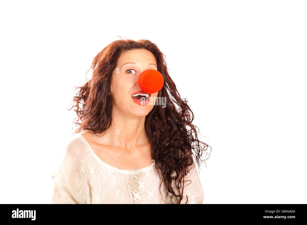 Portrait of a senior woman with red clown nose isolated on white Stock ...