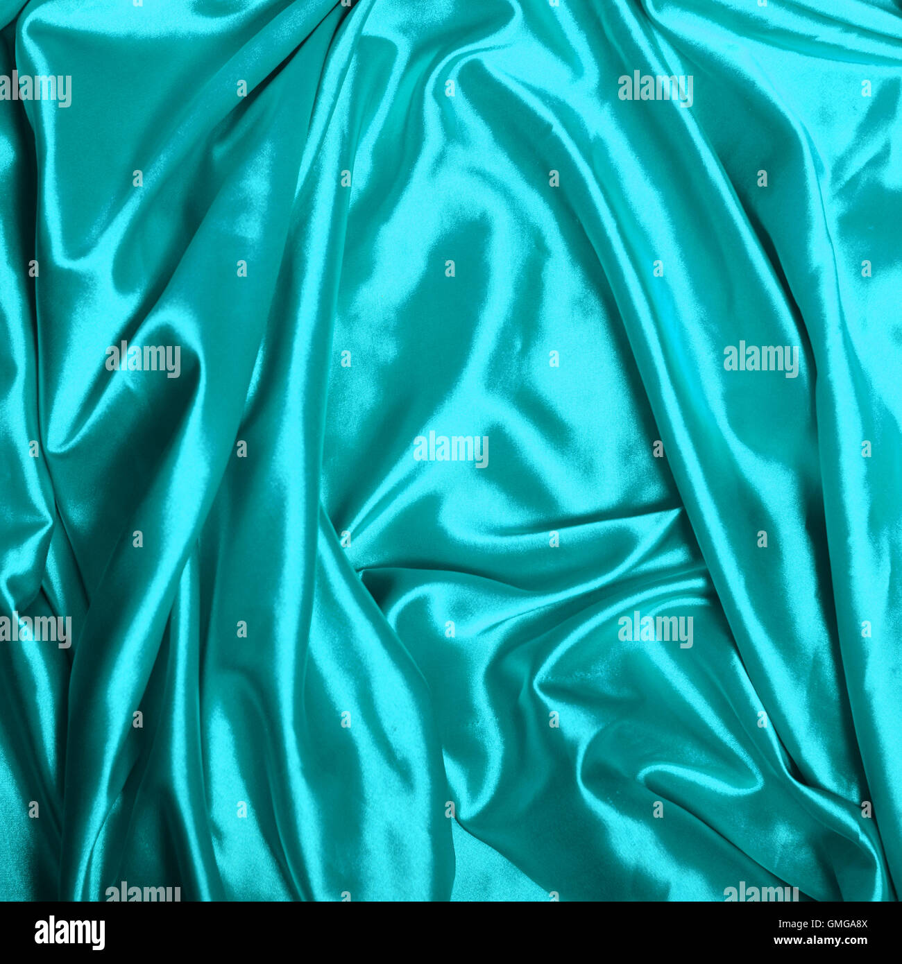 Smooth elegant turquoise silk background Stock Photo - Alamy