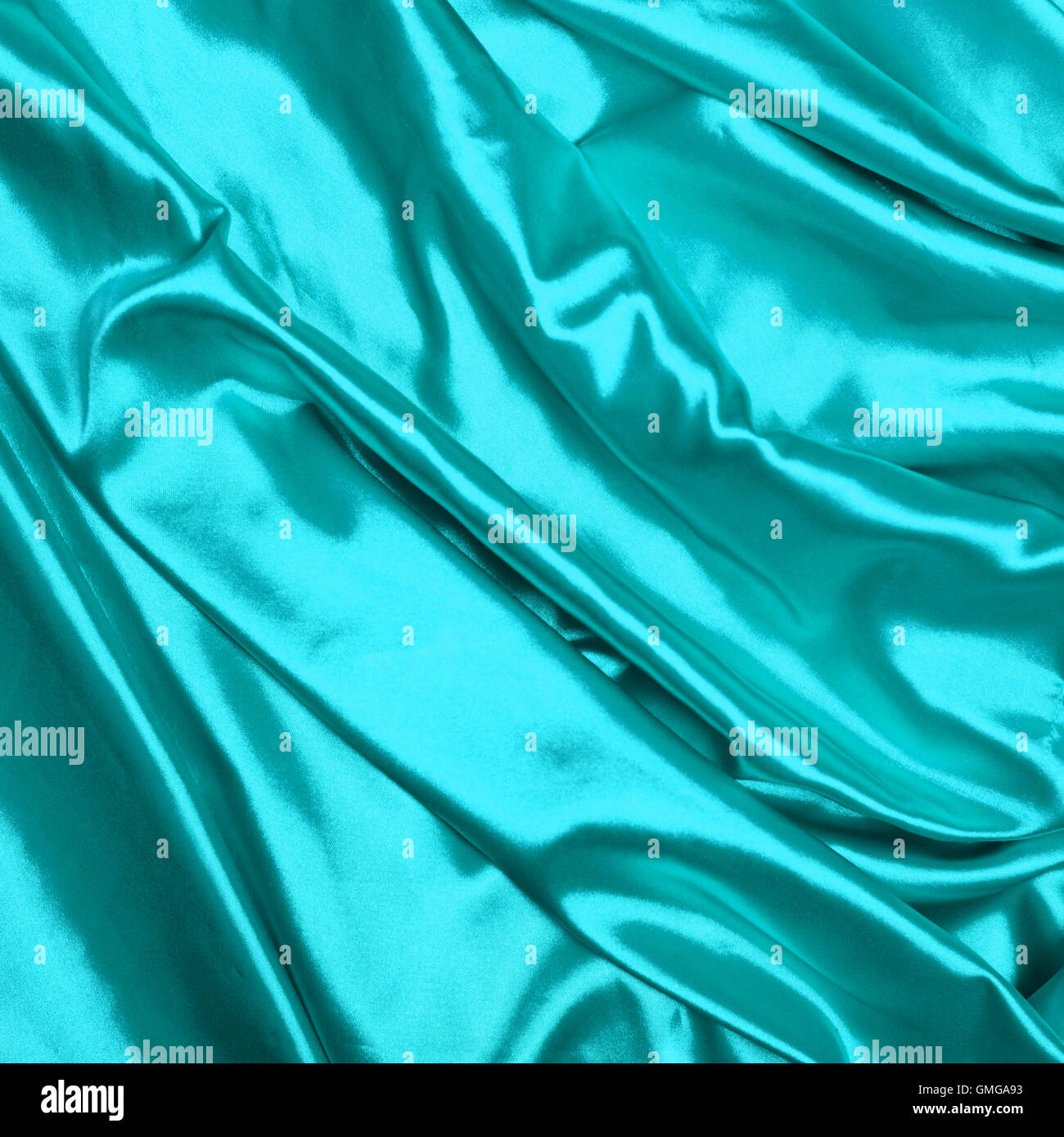Smooth elegant turquoise silk background Stock Photo - Alamy