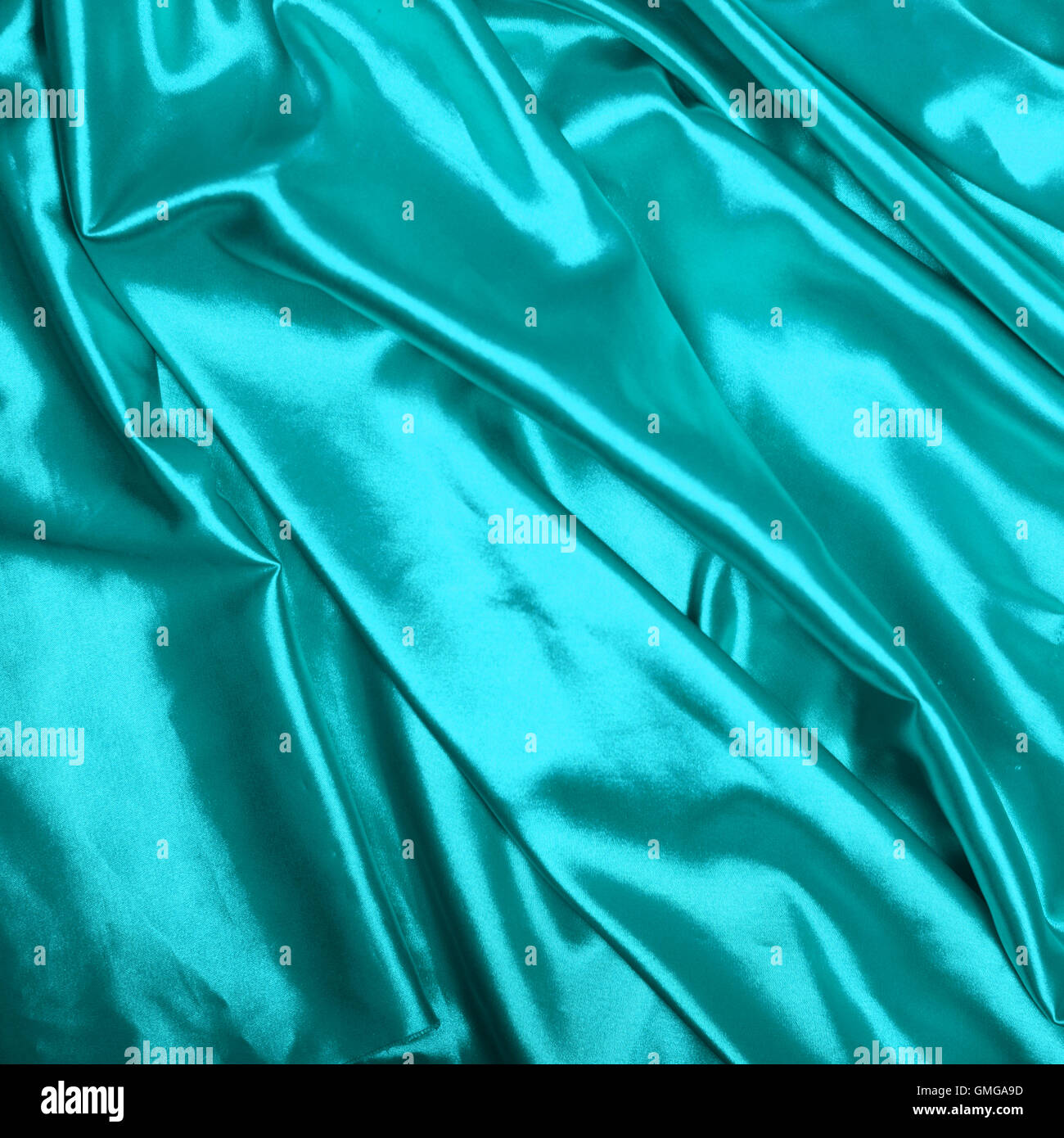 Smooth elegant turquoise silk background Stock Photo - Alamy
