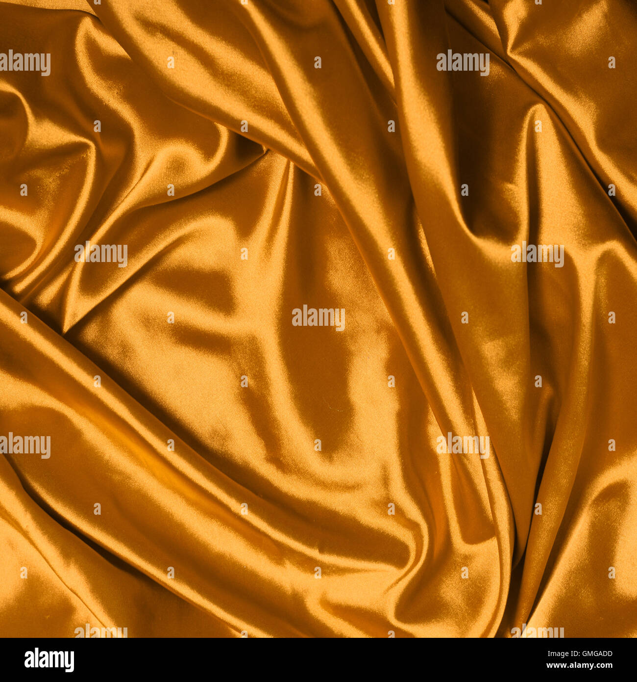 Smooth elegant gold silk background Stock Photo - Alamy