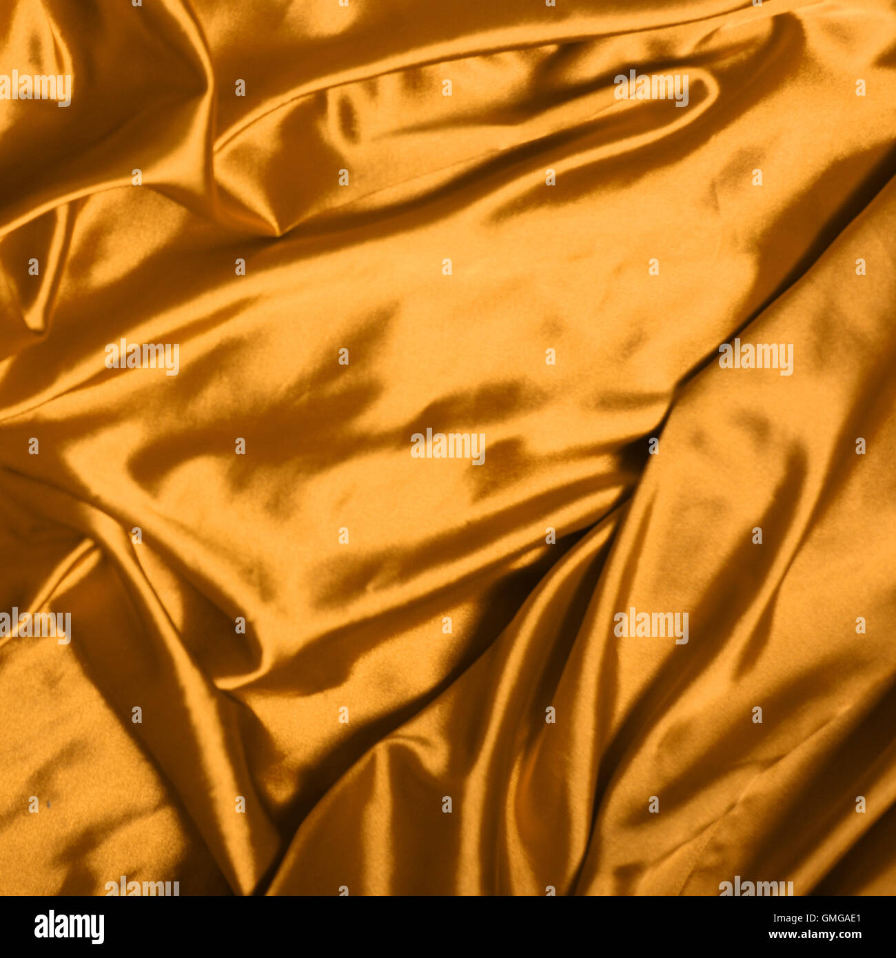 Smooth elegant gold silk background Stock Photo - Alamy