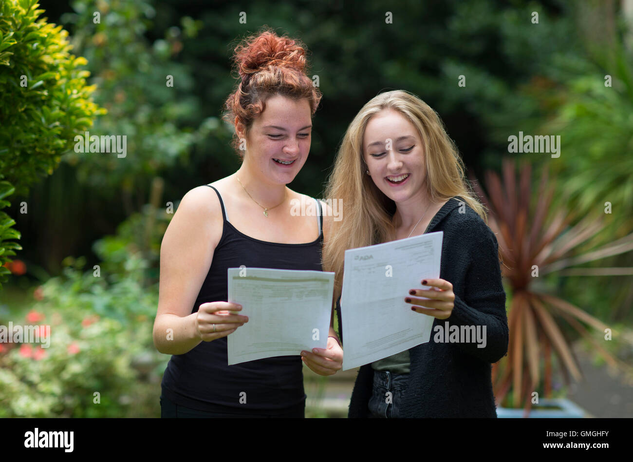 Two female girls celebrate their GCSE exam results at a school in ...