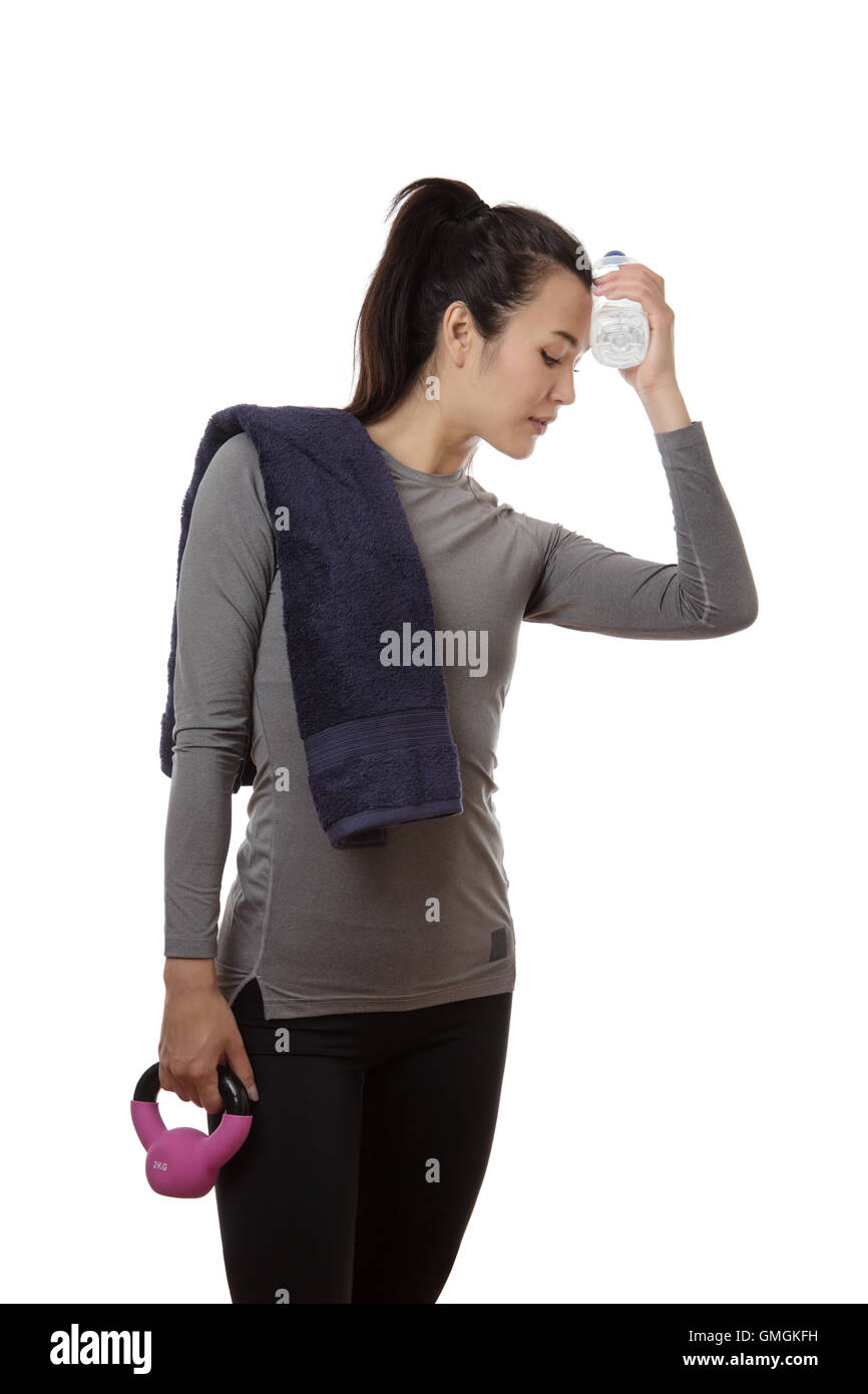 female with a towel over her shoulder Stock Photo - Alamy