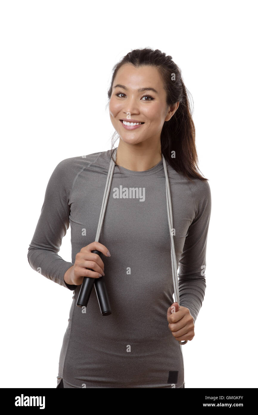 female with a skipping rope around her neck Stock Photo - Alamy