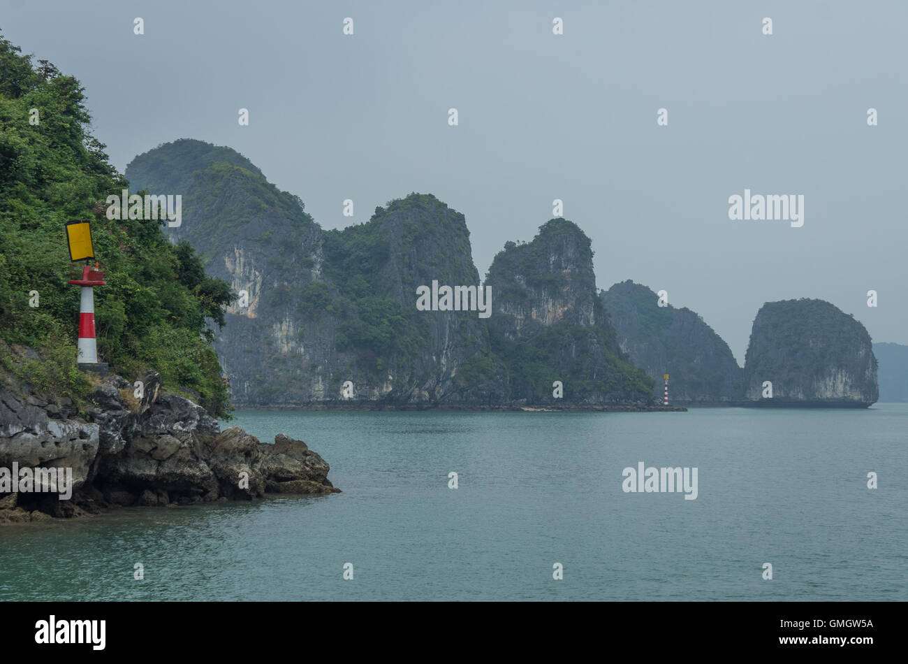 Beautiful limestone mountain scenery Ha Long Bay, North Vietnam. Cloudy ...