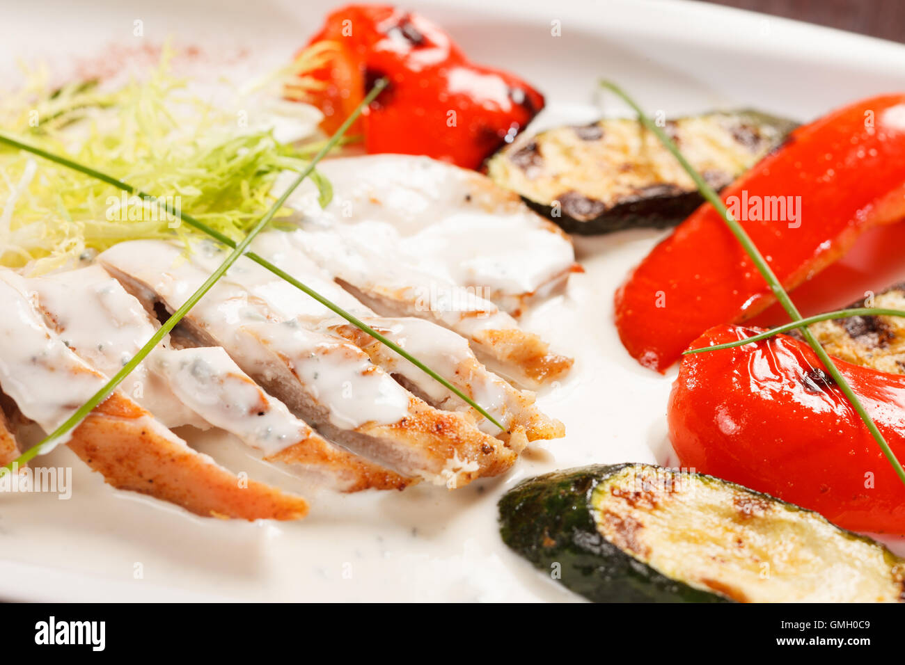 Grilled chicken fillet with vegetables Stock Photo - Alamy