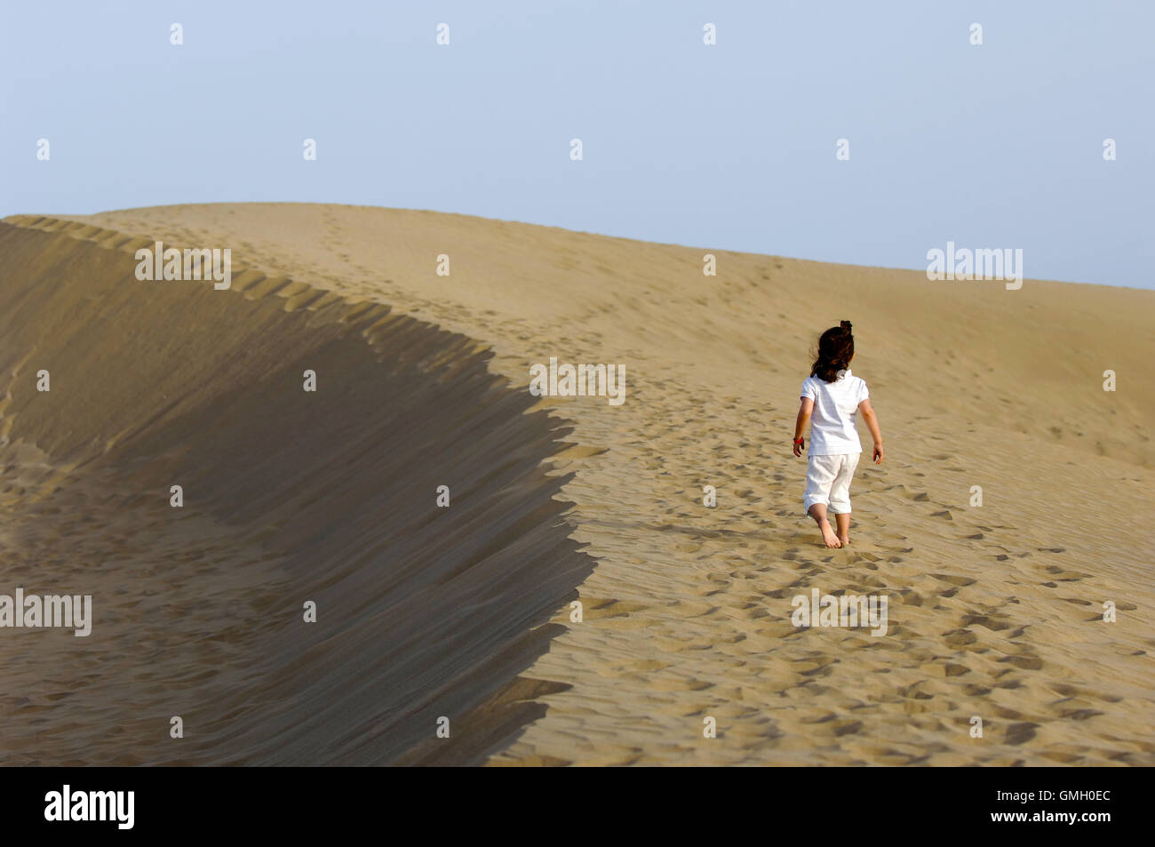 Child in the desert Stock Photo - Alamy