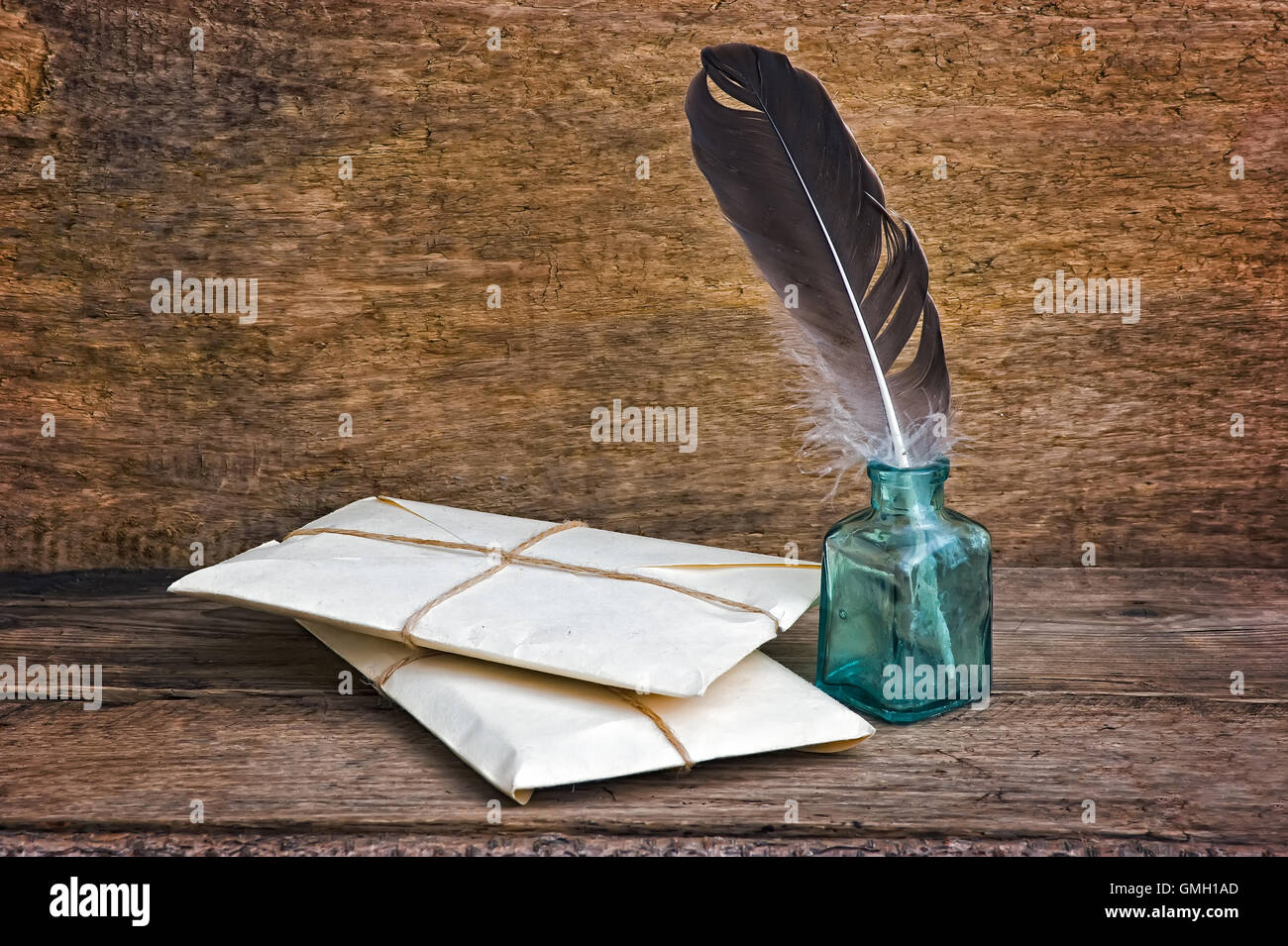 Postage on the background of an old board Stock Photo - Alamy