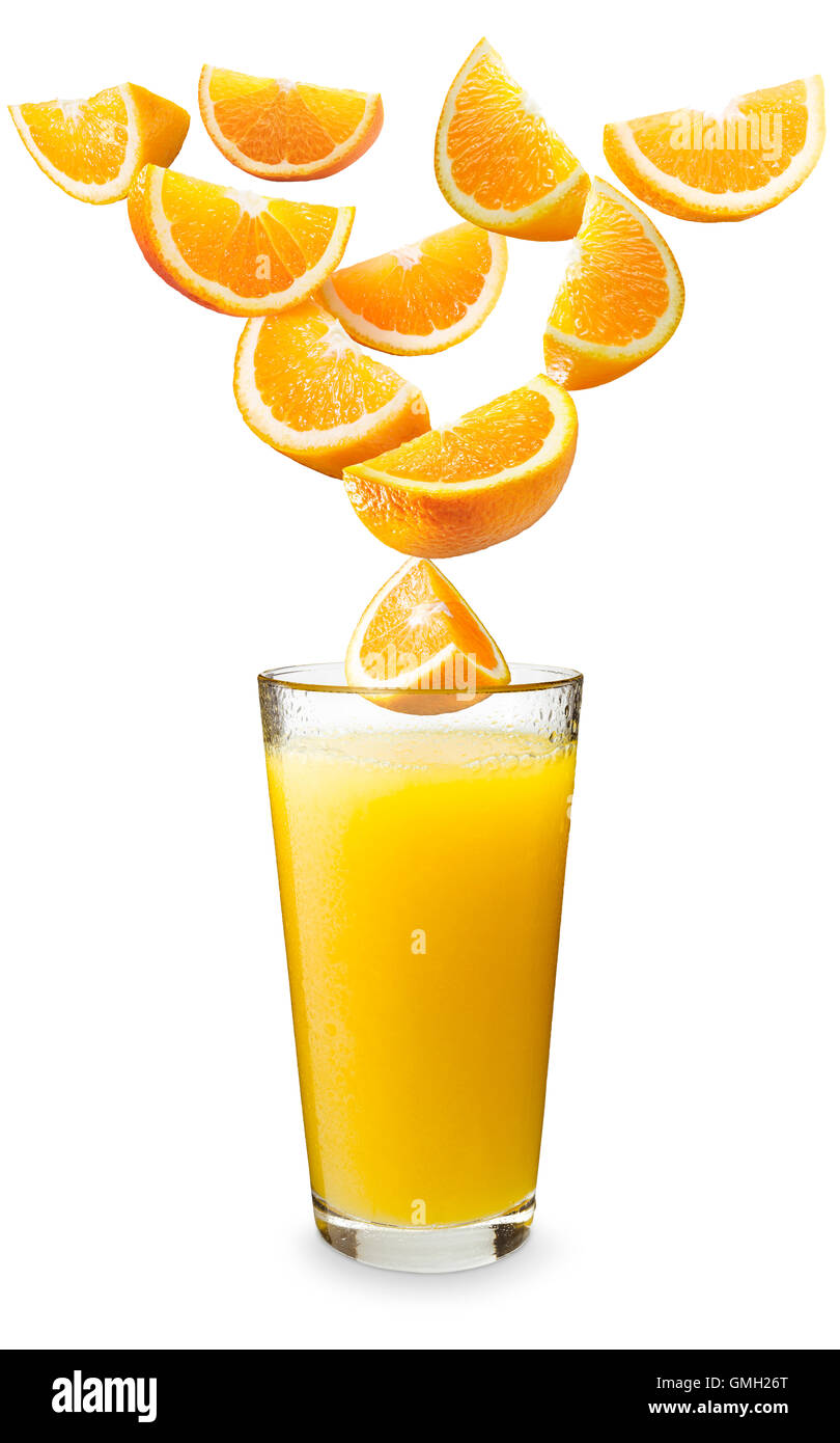Oranges falling in the orange juice Stock Photo - Alamy