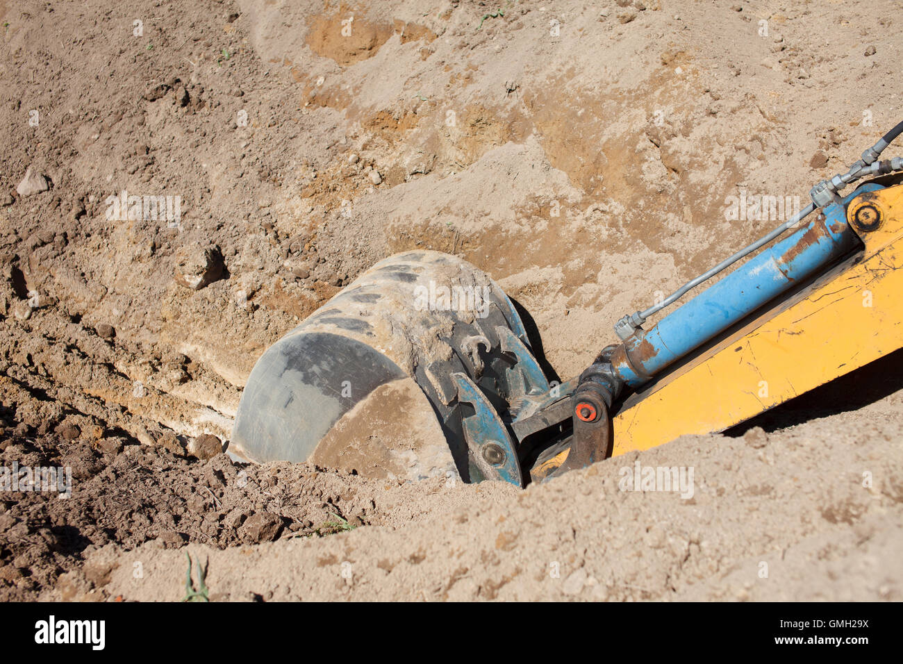 excavator on the building site Stock Photo - Alamy