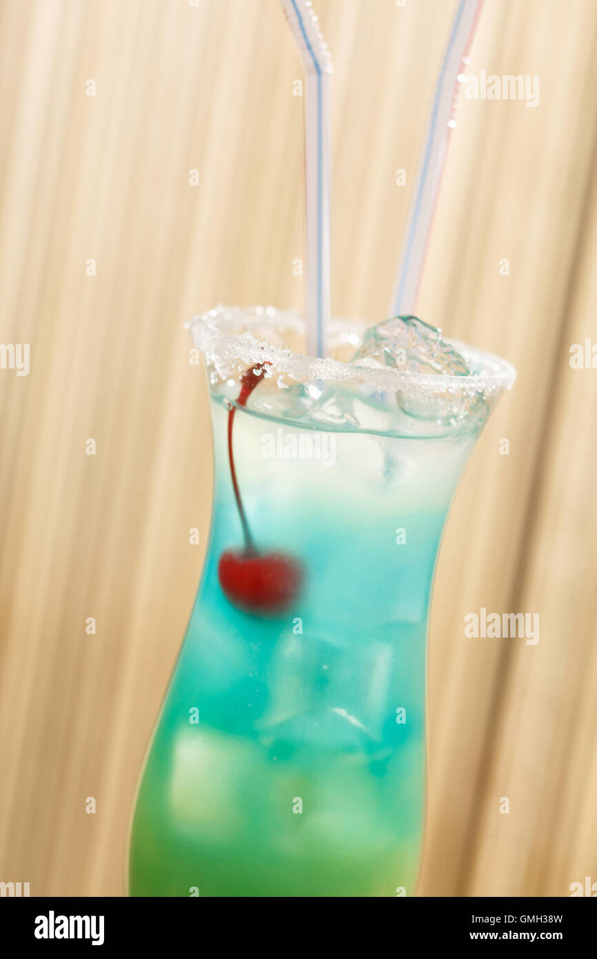 blue cocktail with cherry Stock Photo - Alamy