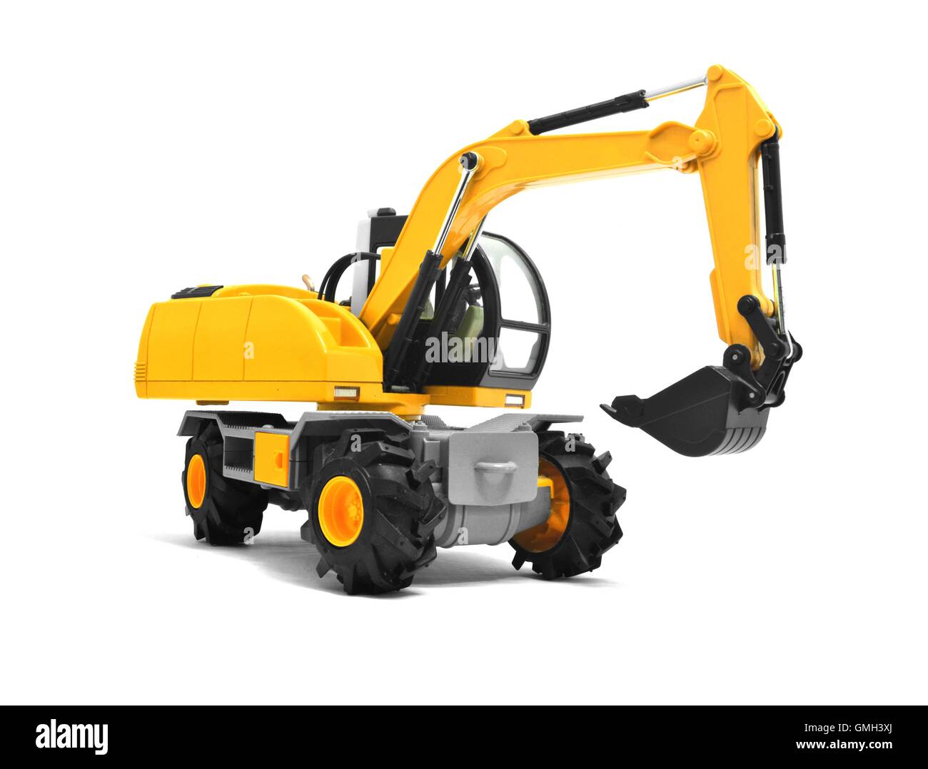 Modern yellow excavator machines Stock Photo - Alamy