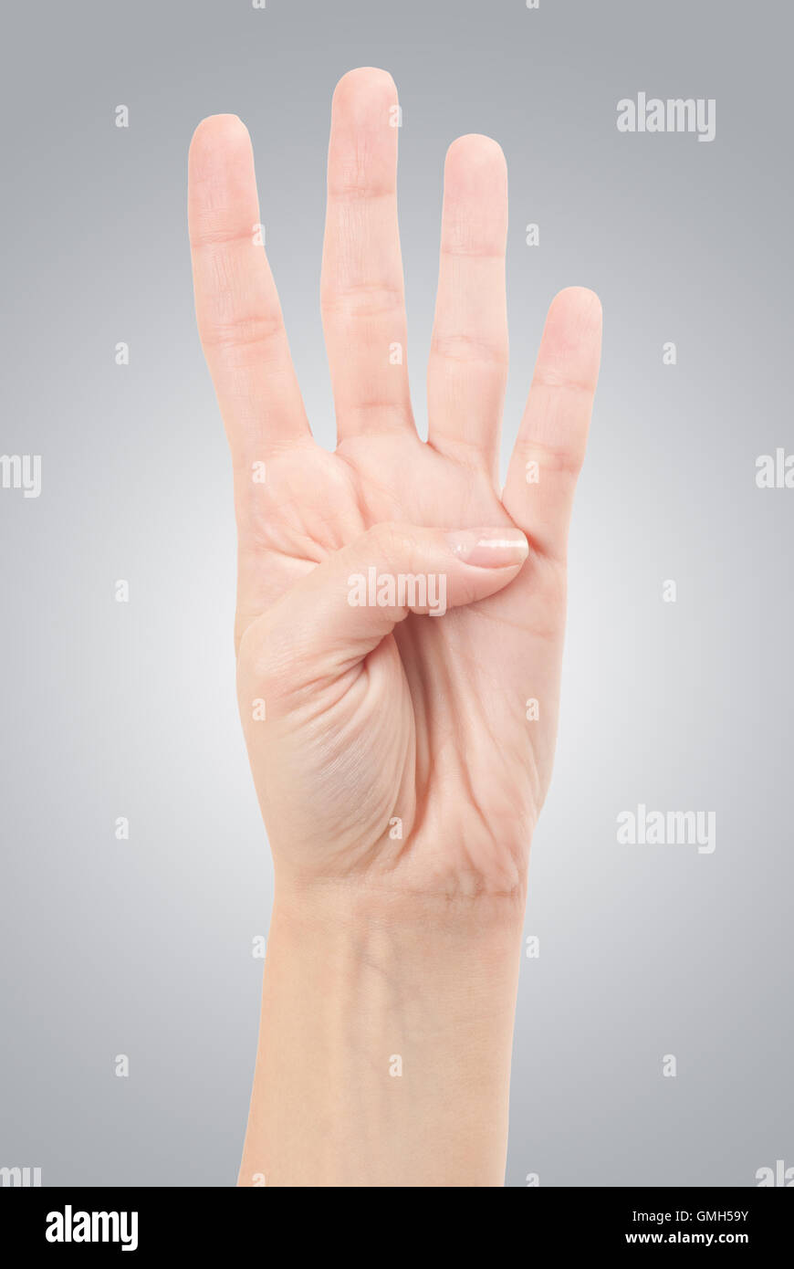 Hand Gesture - Number Four isolated on white Stock Photo - Alamy