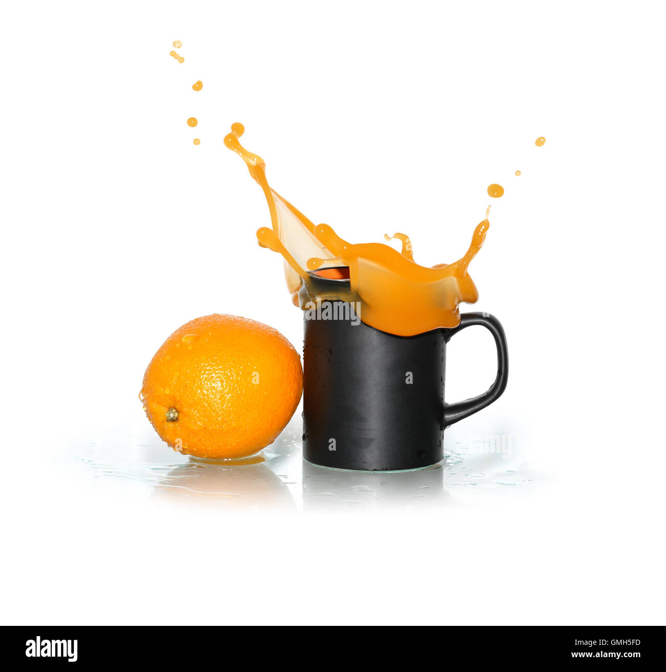 Splashing Orange Juice Stock Photo - Alamy