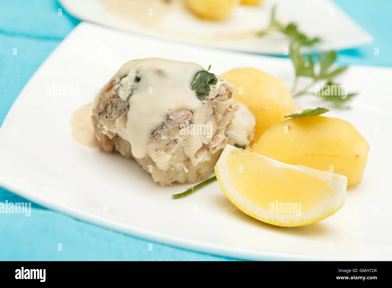 fish with potatoes Stock Photo - Alamy