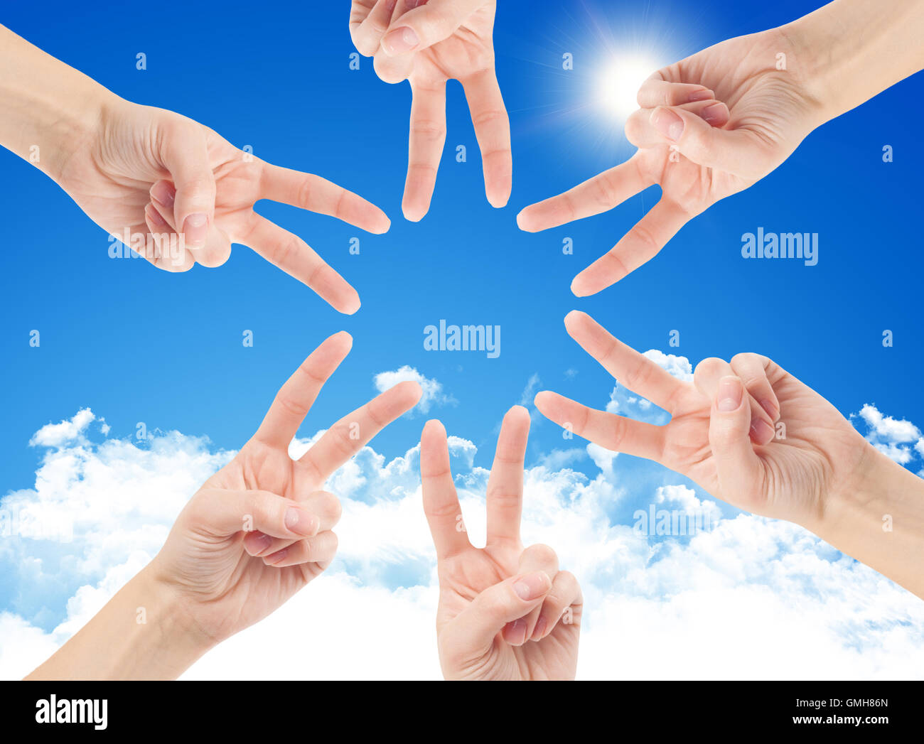 Hands of teamwork , forming the star shape Stock Photo - Alamy