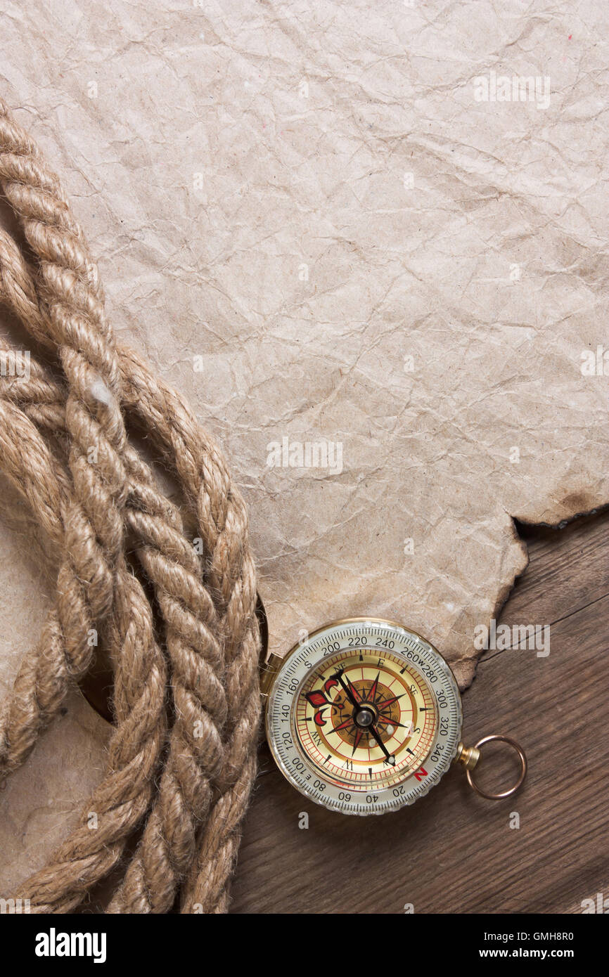 Compass with a rope Stock Photo - Alamy