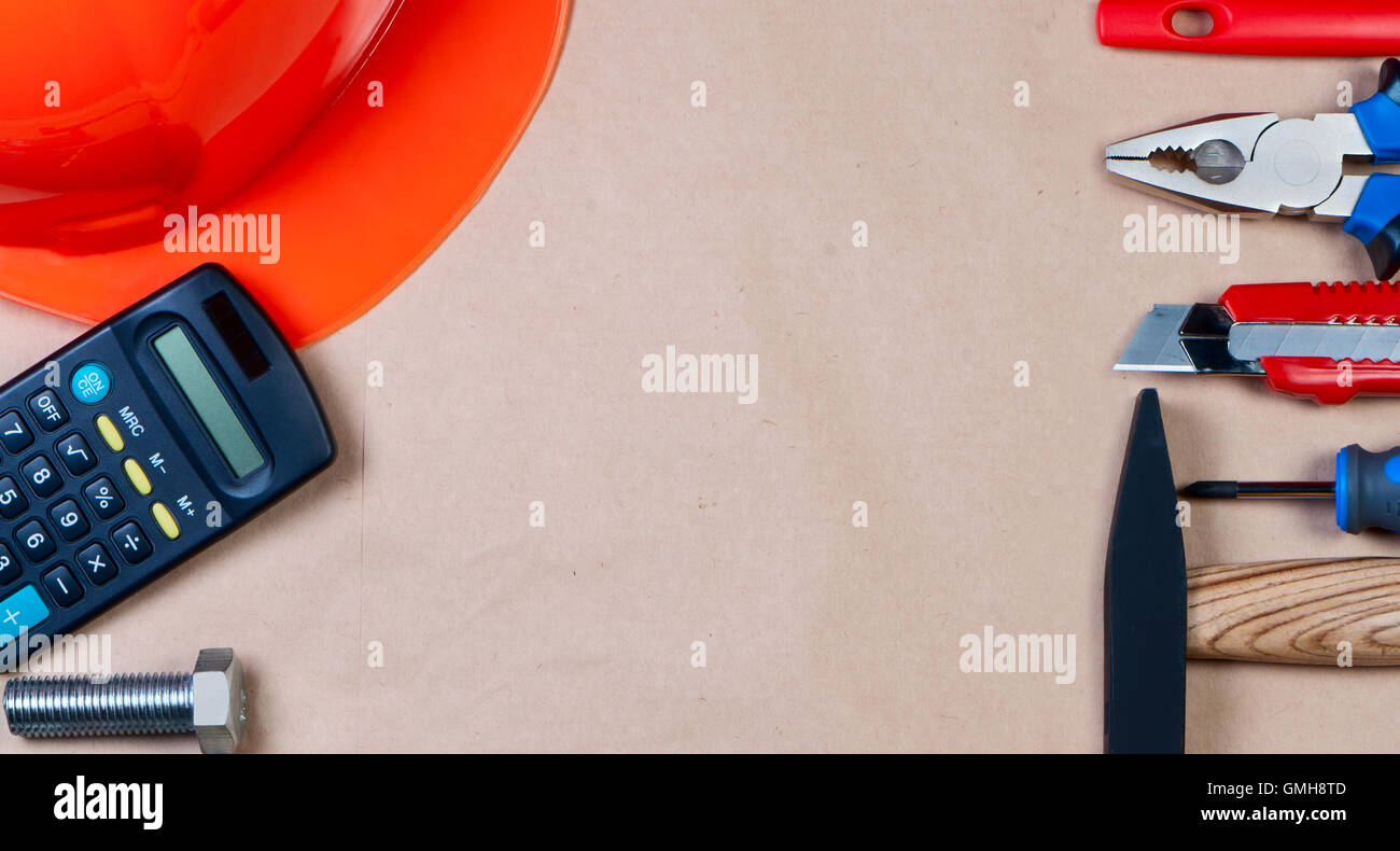 Tool on paper background top view Stock Photo - Alamy