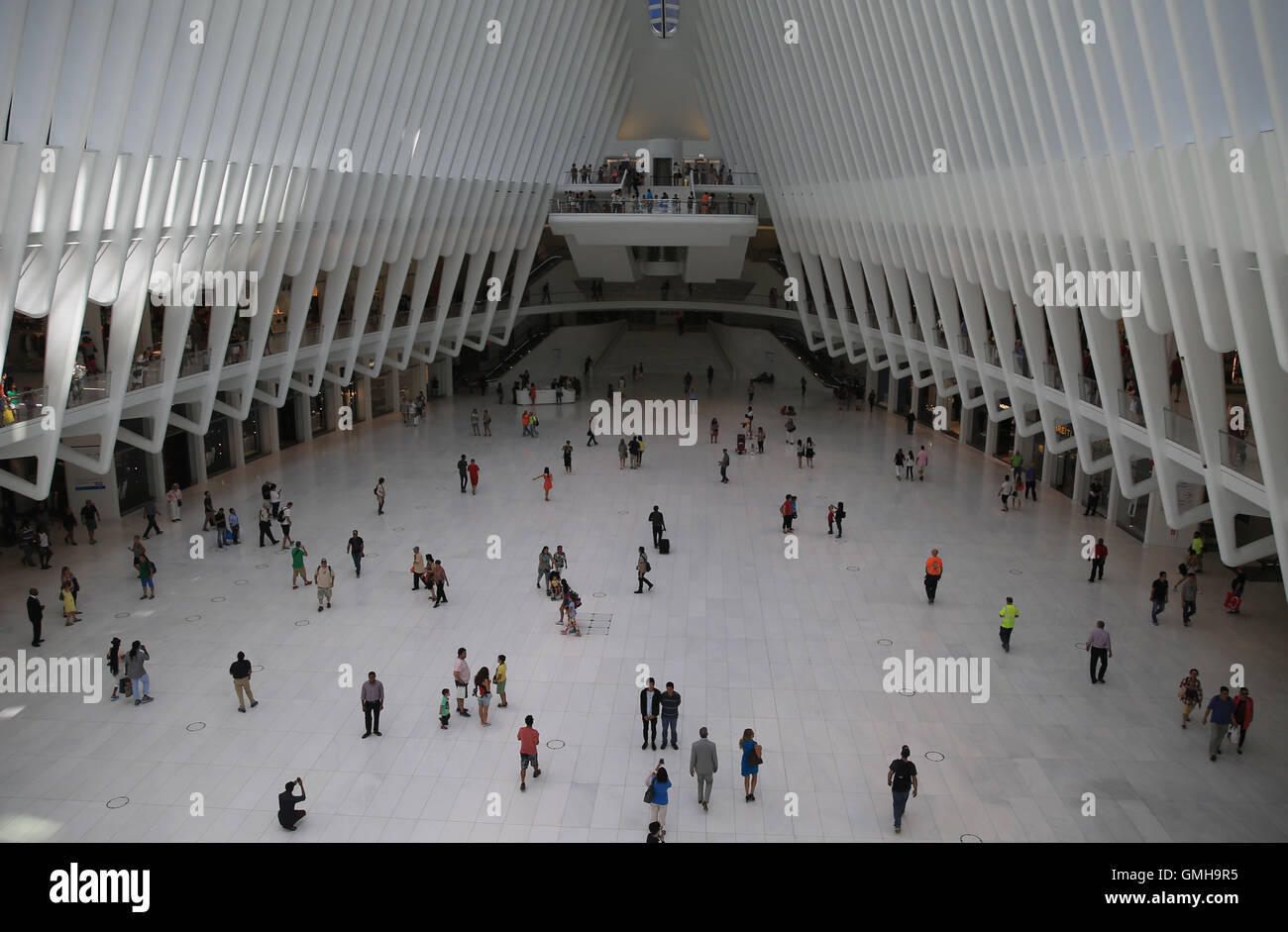 People walk through the Oculus mall at World Trade Center on Monday ...