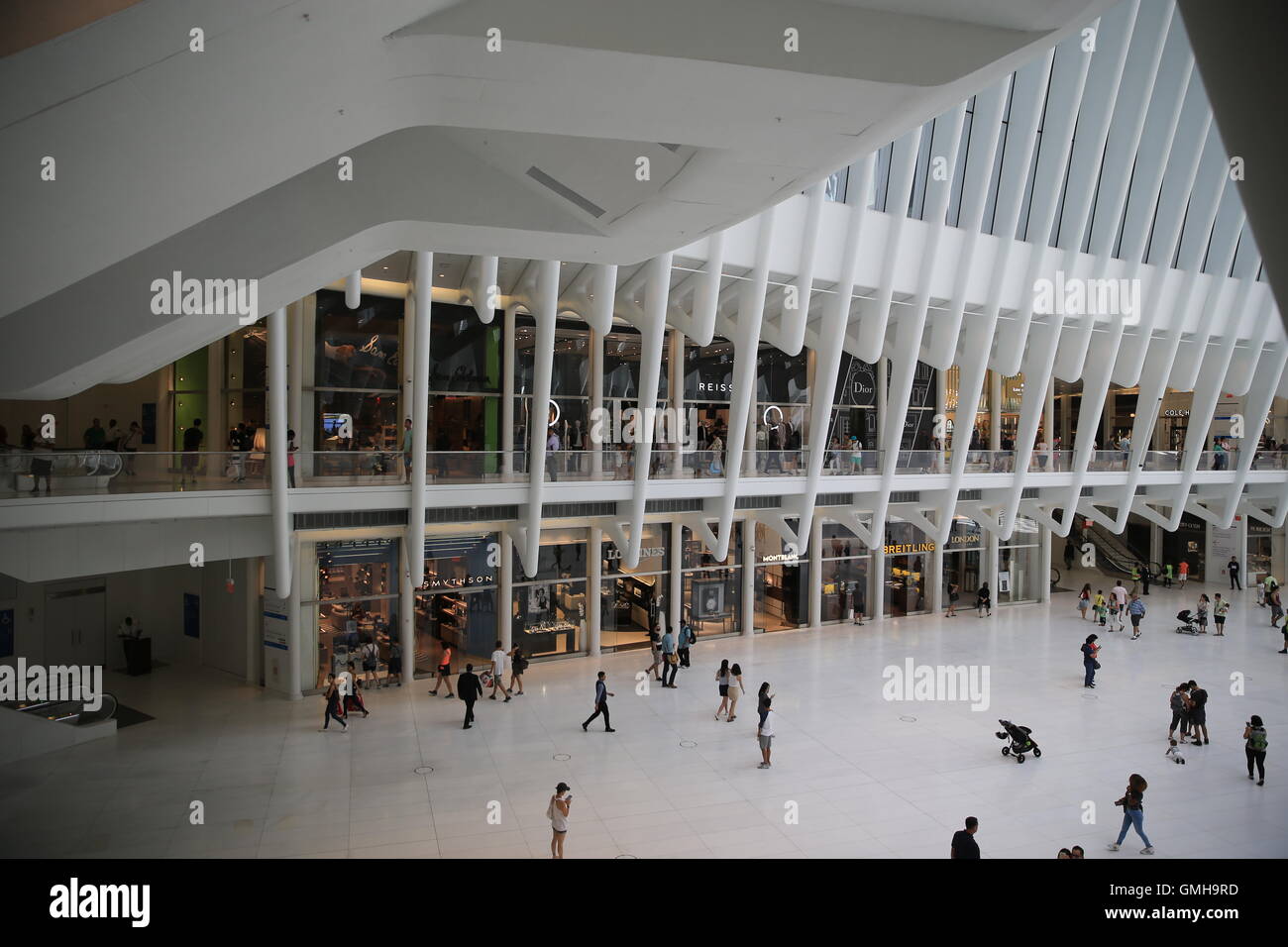 People walk through the Oculus mall at World Trade Center on Monday ...
