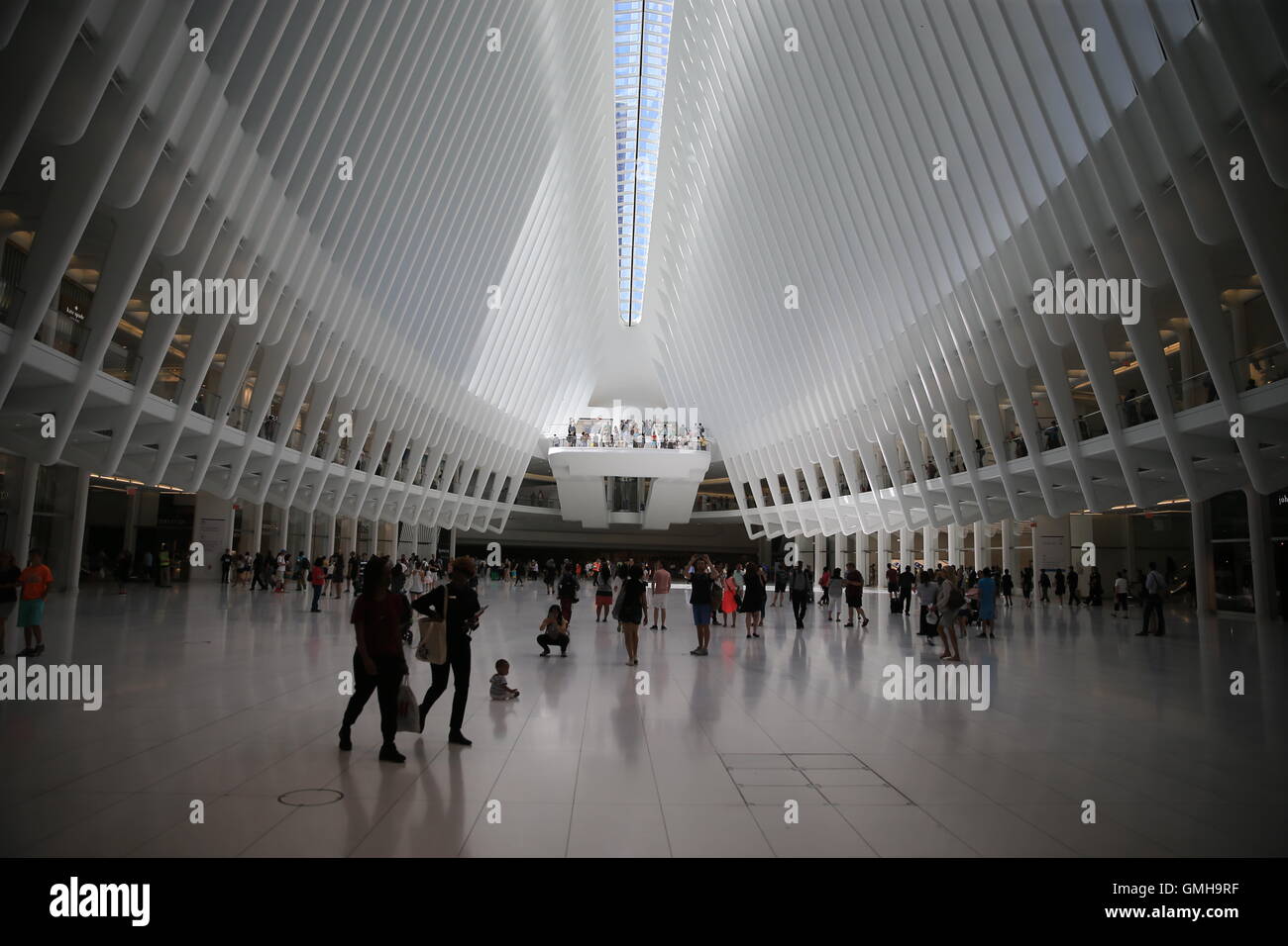 People walk through the Oculus mall at World Trade Center on Monday ...
