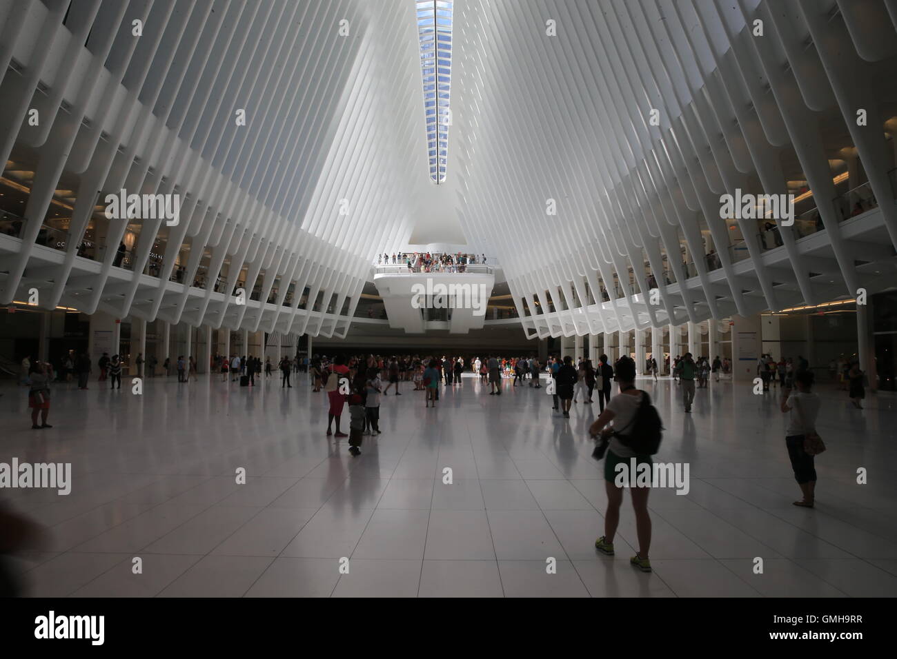 People walk through the Oculus mall at World Trade Center on Monday ...