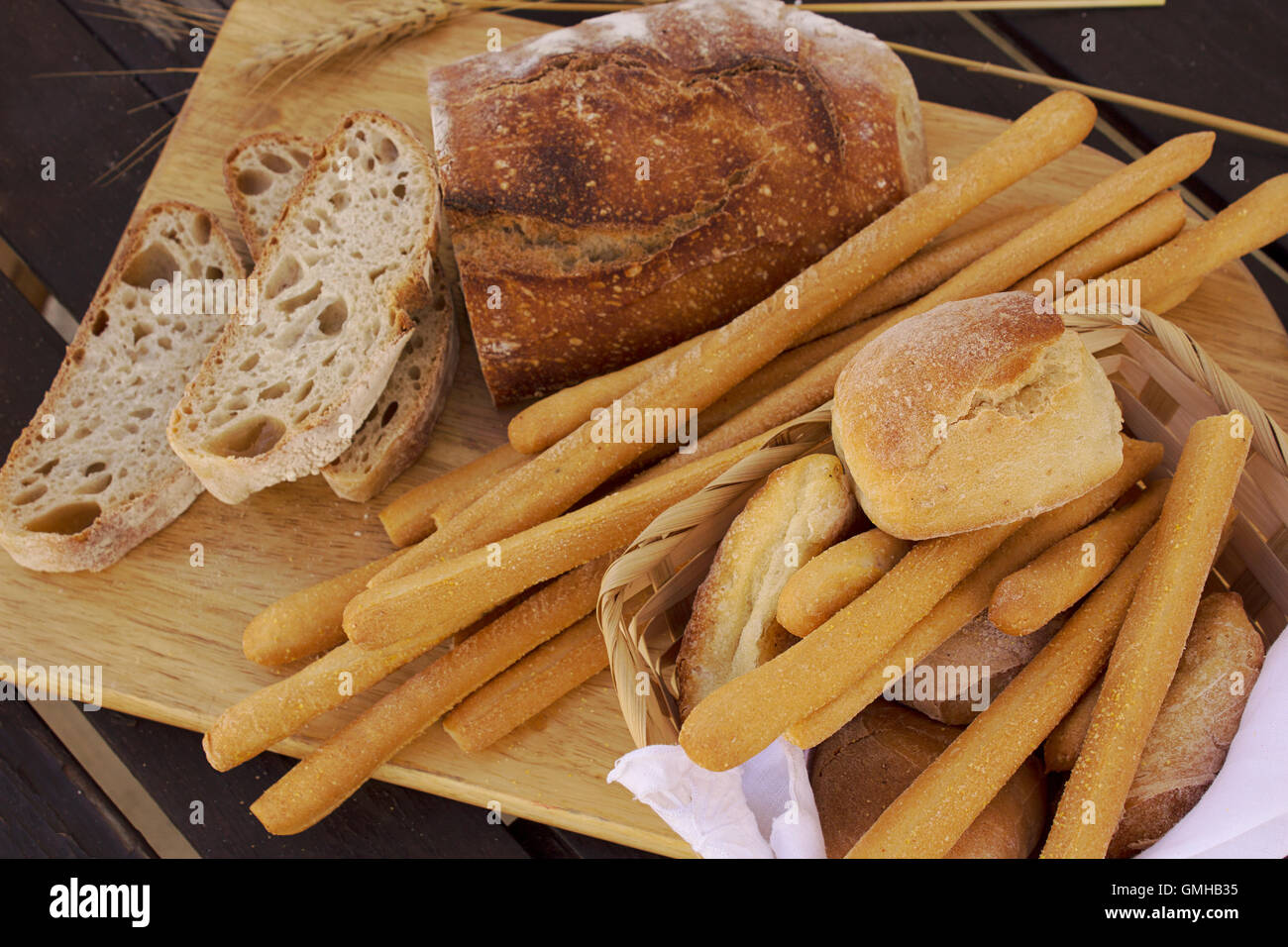 Collection of baked products including different sorts of bread and ...