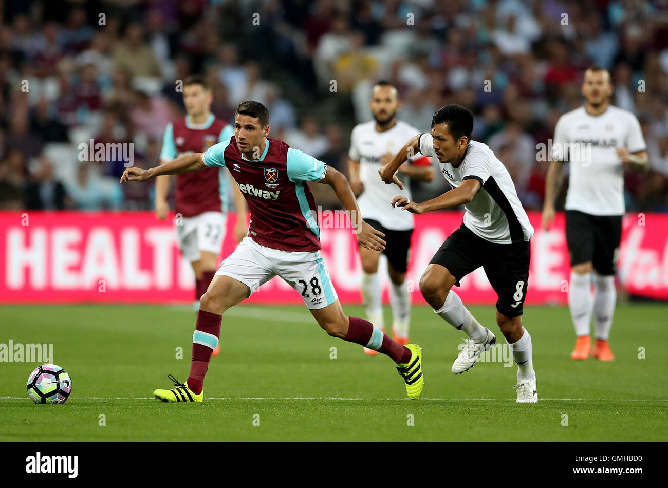 West ham United's Jonathan Calleri (left) and Astra Giurgiu's Takayuki ...