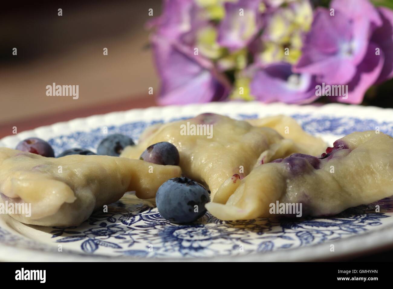 Polish Pierogi with blueberries - fruits dumplings Stock Photo - Alamy
