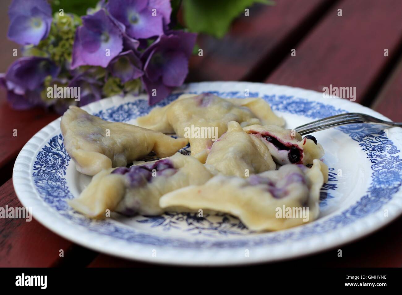 Polish Pierogi with blueberries - fruits dumplings Stock Photo - Alamy