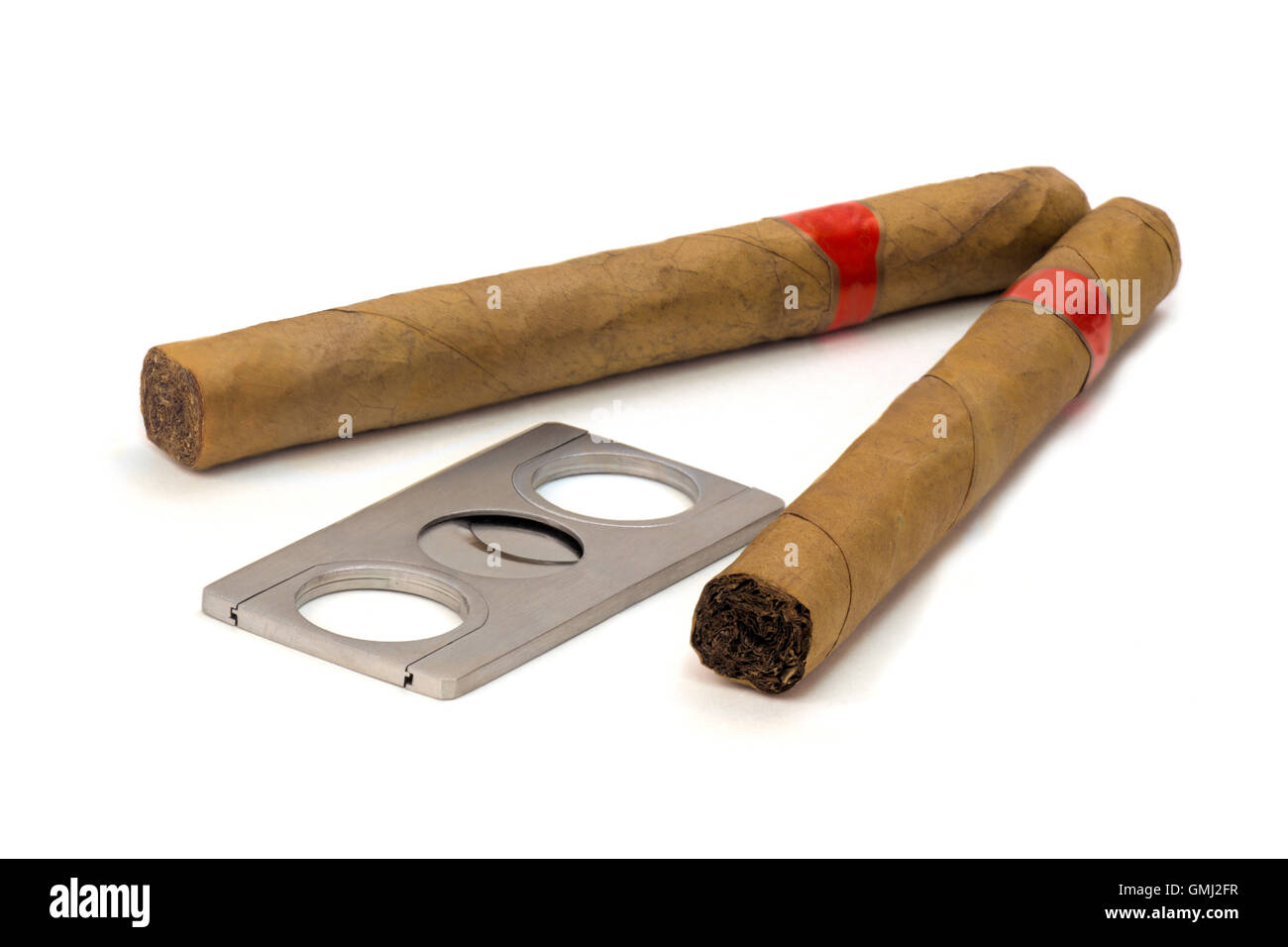 Two cigars isolated on white background Stock Photo - Alamy