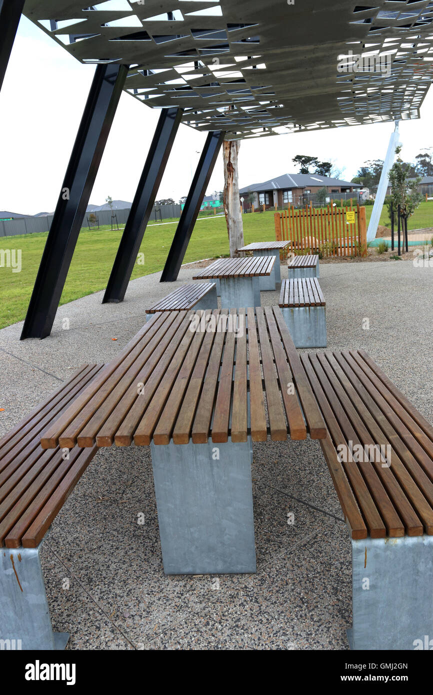 Wooden Picnic table in the park Stock Photo - Alamy