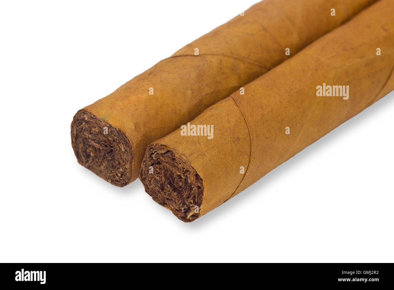 Two cigars isolated on white background Stock Photo - Alamy