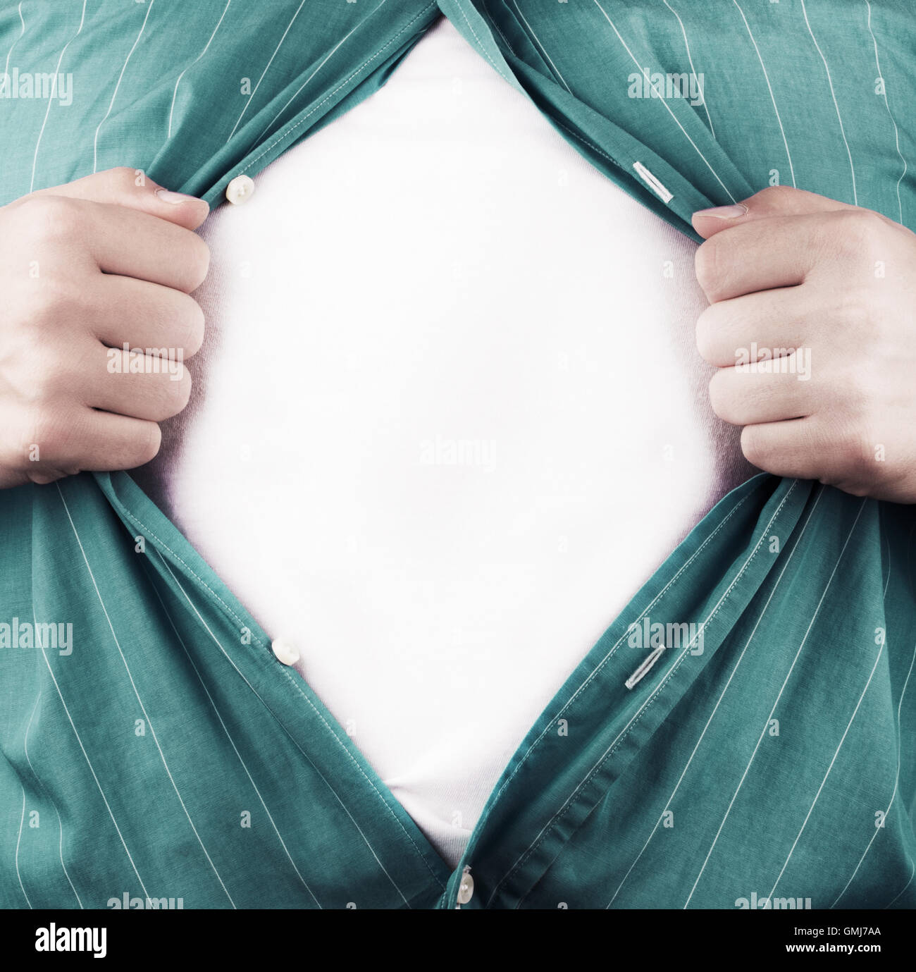 Business man tearing off his shirt Stock Photo - Alamy