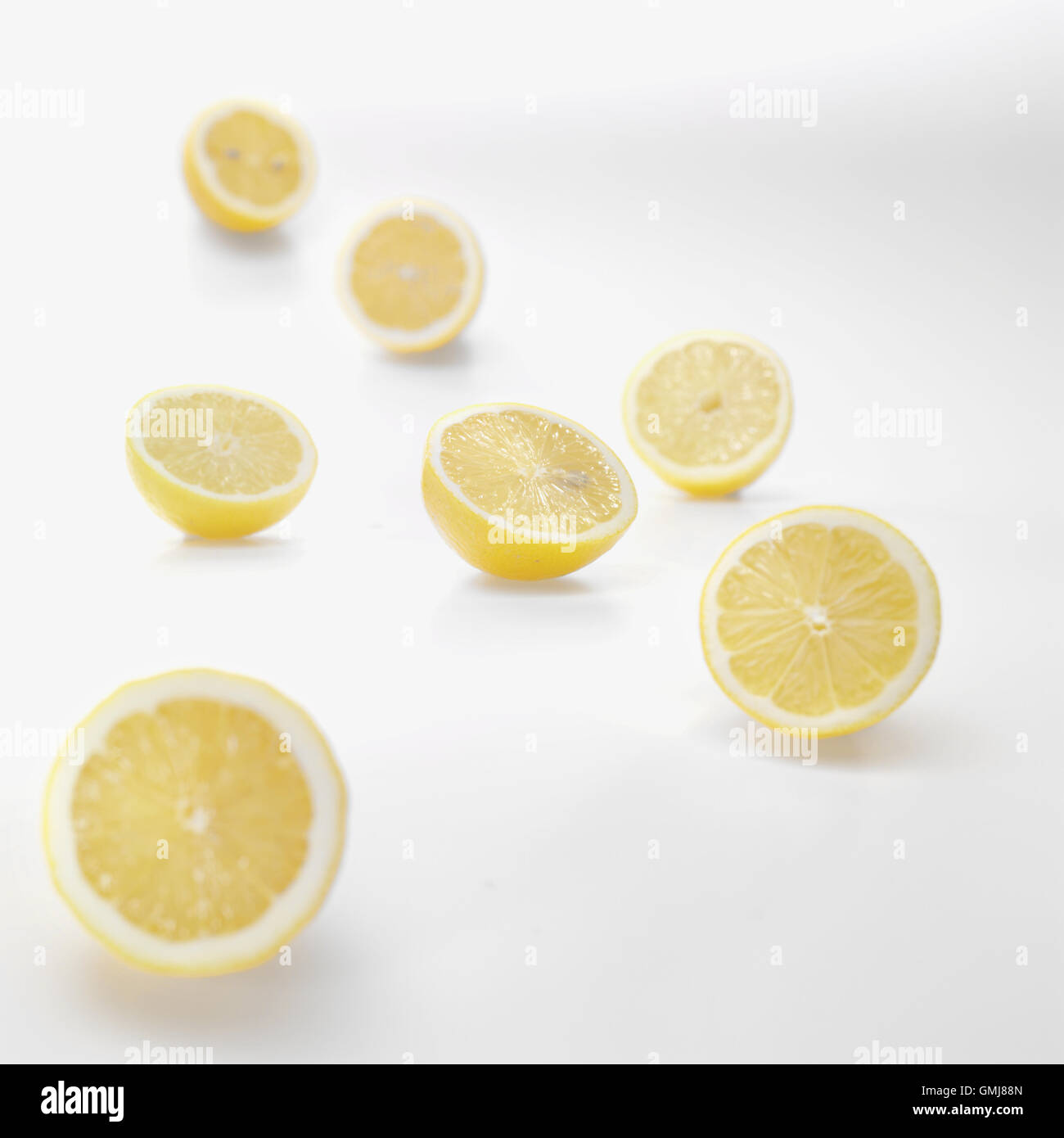 Cut Yellow lemons Stock Photo - Alamy