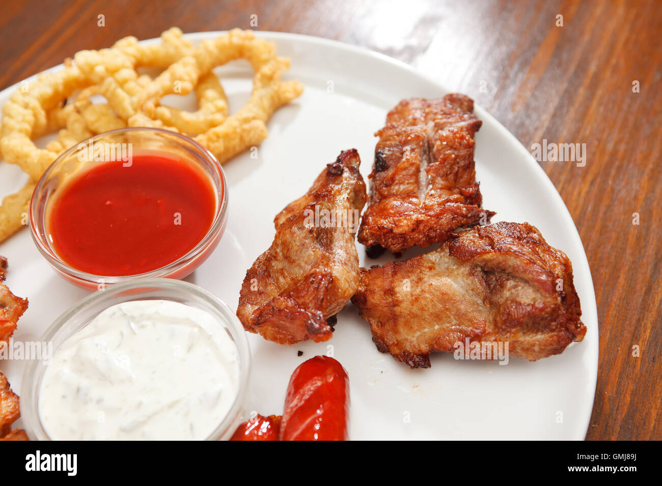 Appetizer plate with dipping sauces Stock Photo - Alamy