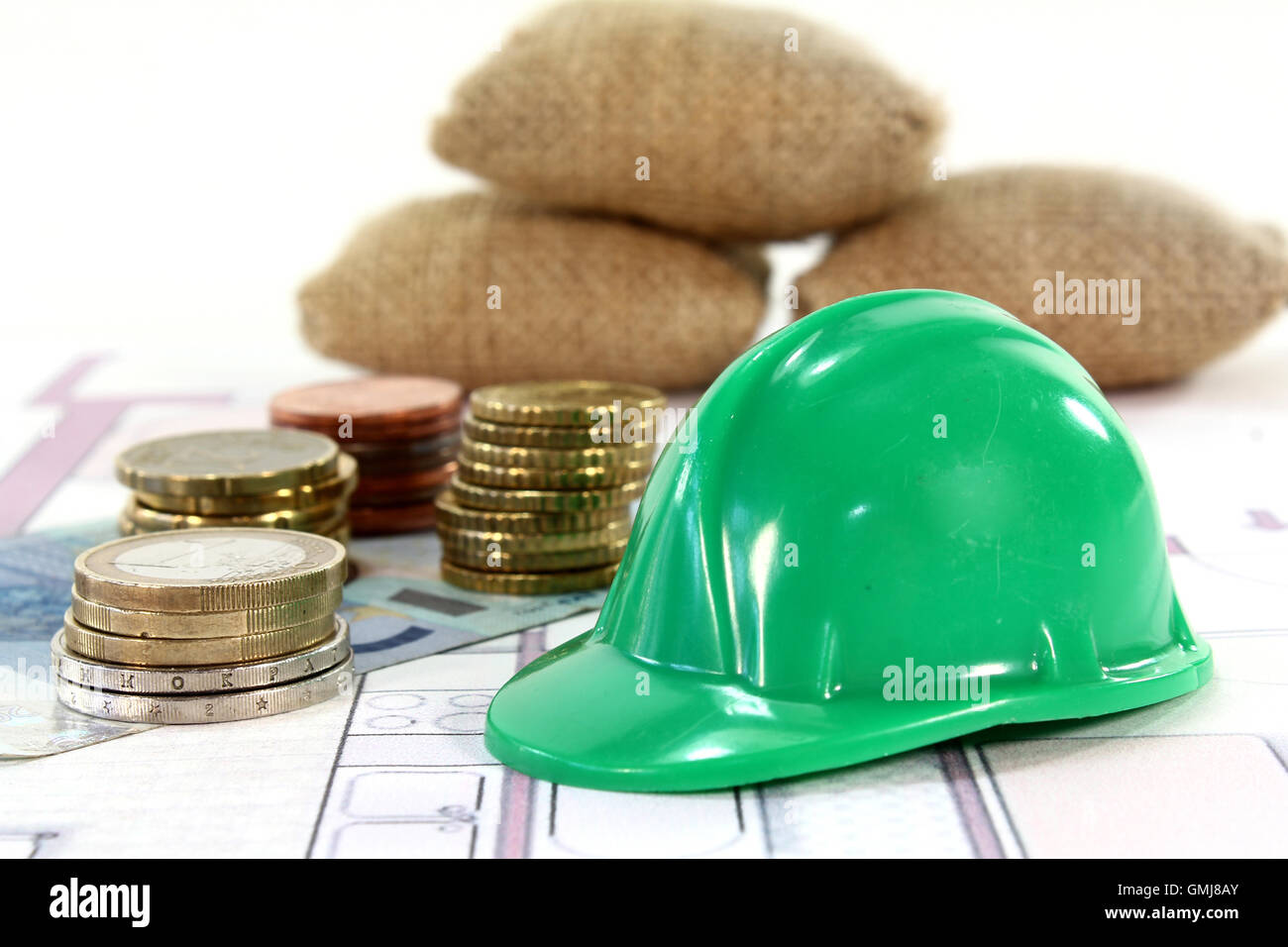 Money construction hi-res stock photography and images - Alamy