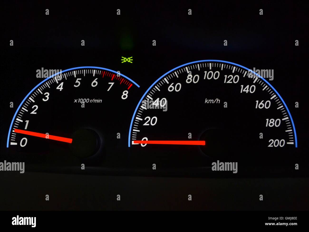 Speedometer over black Stock Photo - Alamy