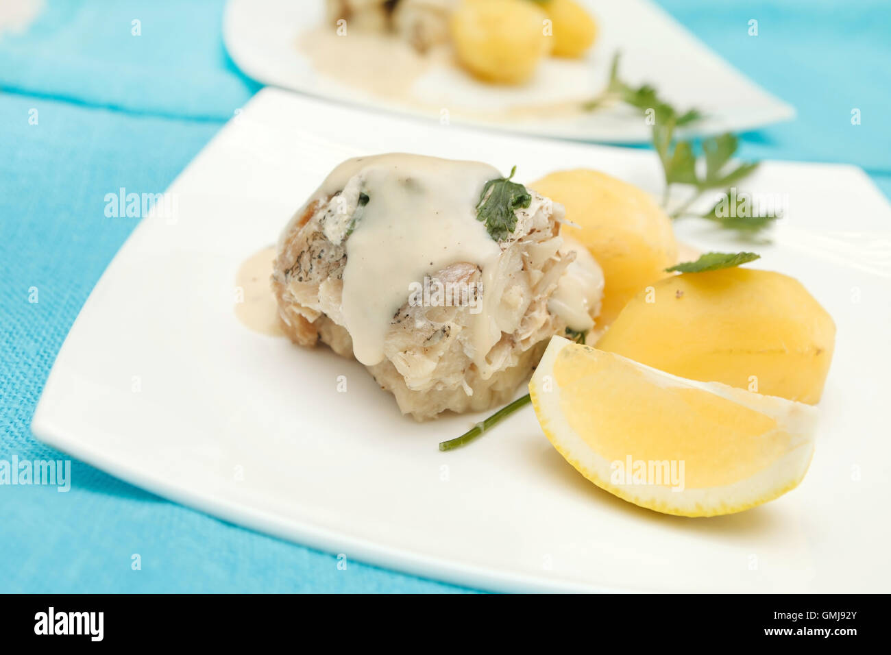 fish with potatoes Stock Photo - Alamy