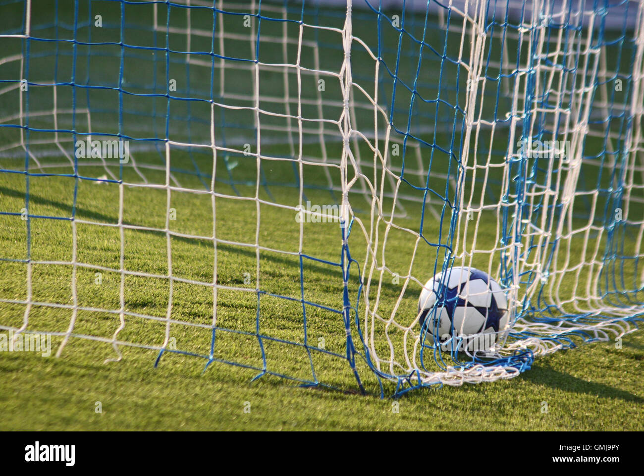 KYIV, UKRAINE - April 23, 2011: Soccer ball inside the net after Dynamo ...