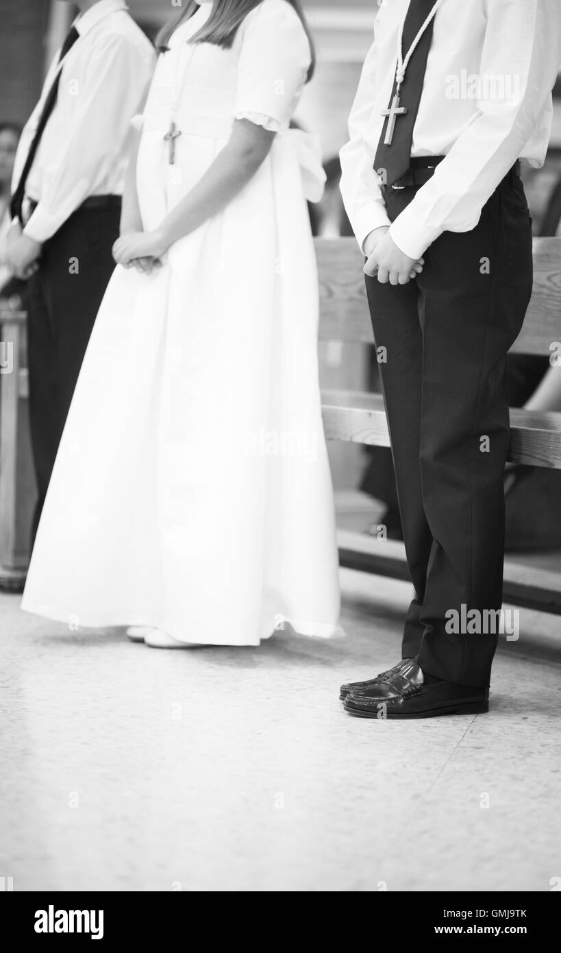 Catholic first communion religious ceremony girl in white dress and ...
