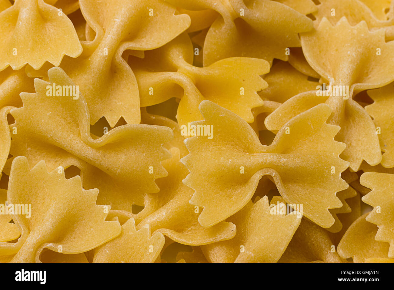 Bow tie pasta Close up. Farfalle pasta. Farfalle bows italian pasta ...